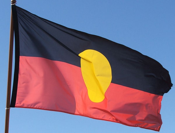 The Aboriginal flag and the Sydney Harbour Bridge - 12StoryLibrary.com